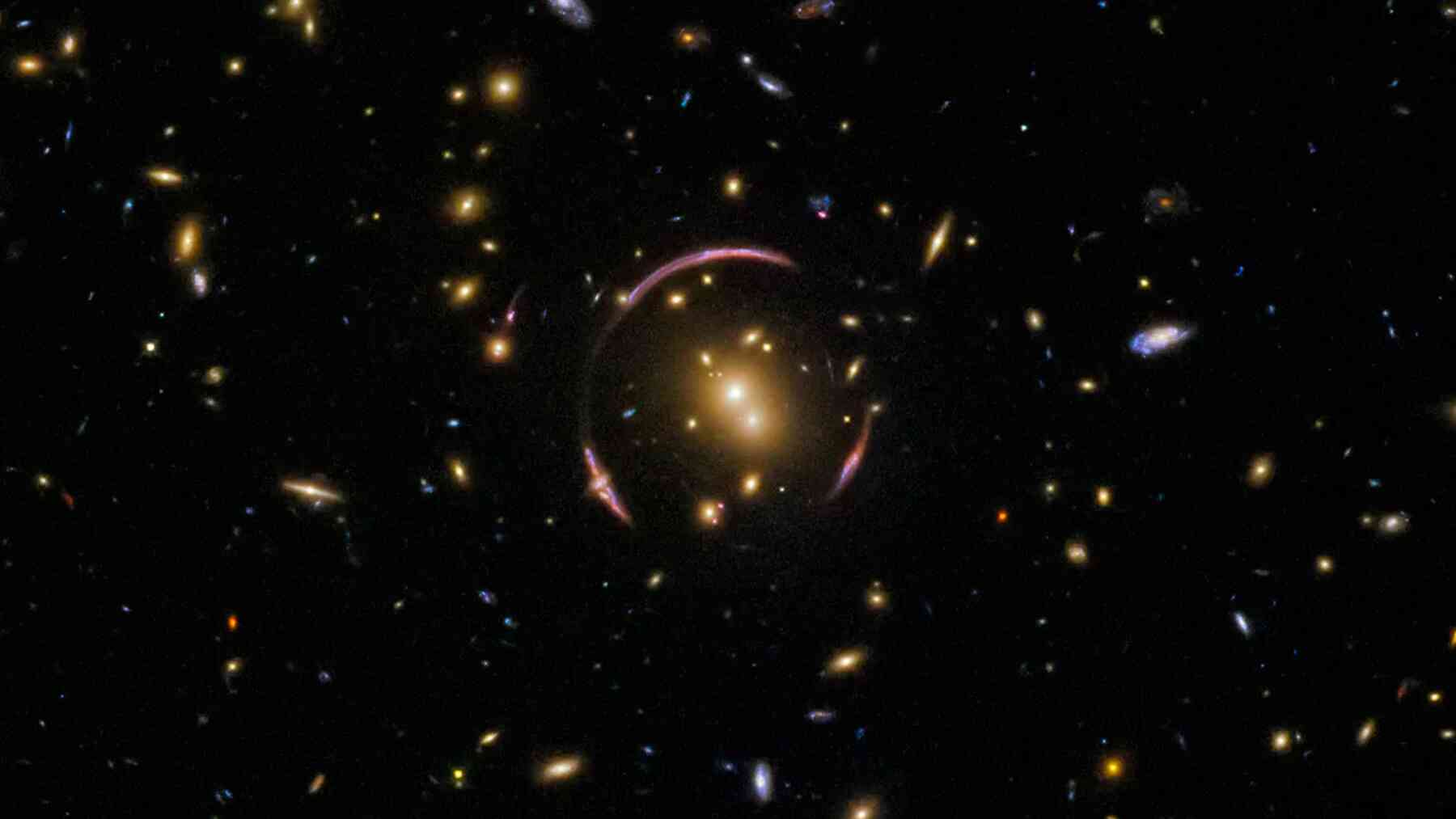 After 1.7 million observations, Hubble found a galaxy cluster so ...